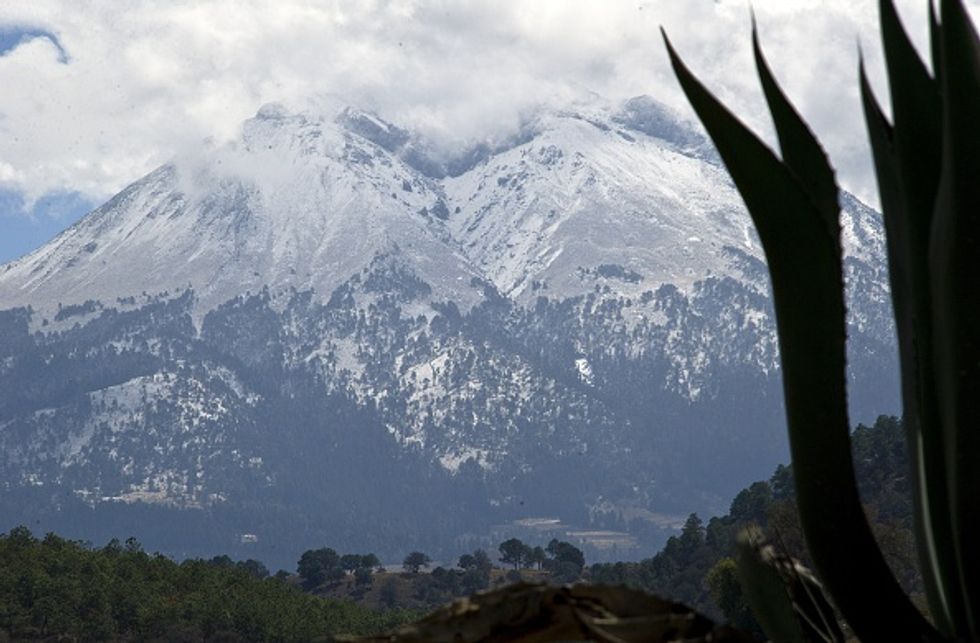 Human Remains Found Frozen in a Glacier Atop Mexico's Tallest Mountain ...