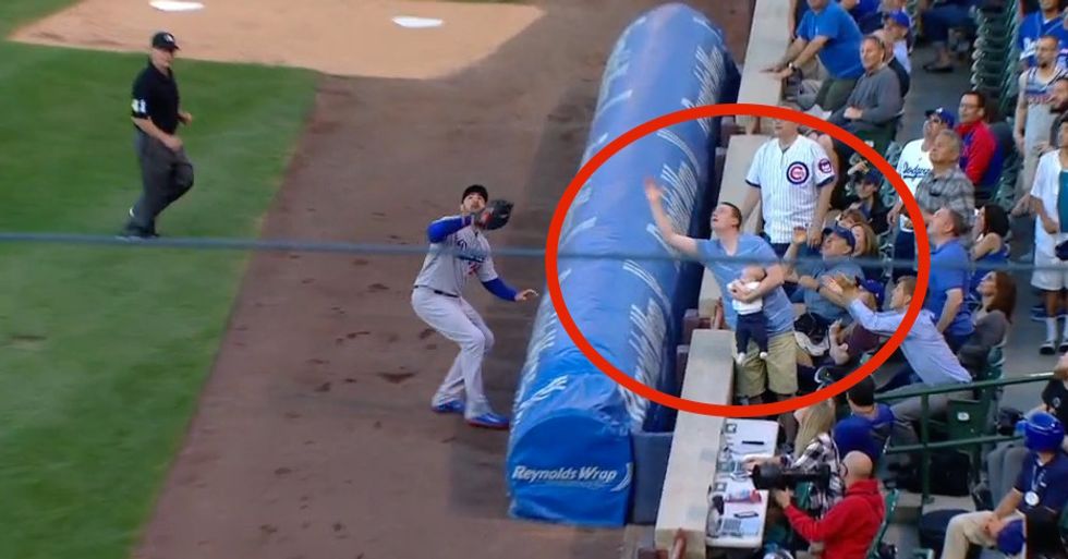 Man Holding Baby Makes Crazy Catch at Wrigley Field That Stuns ...