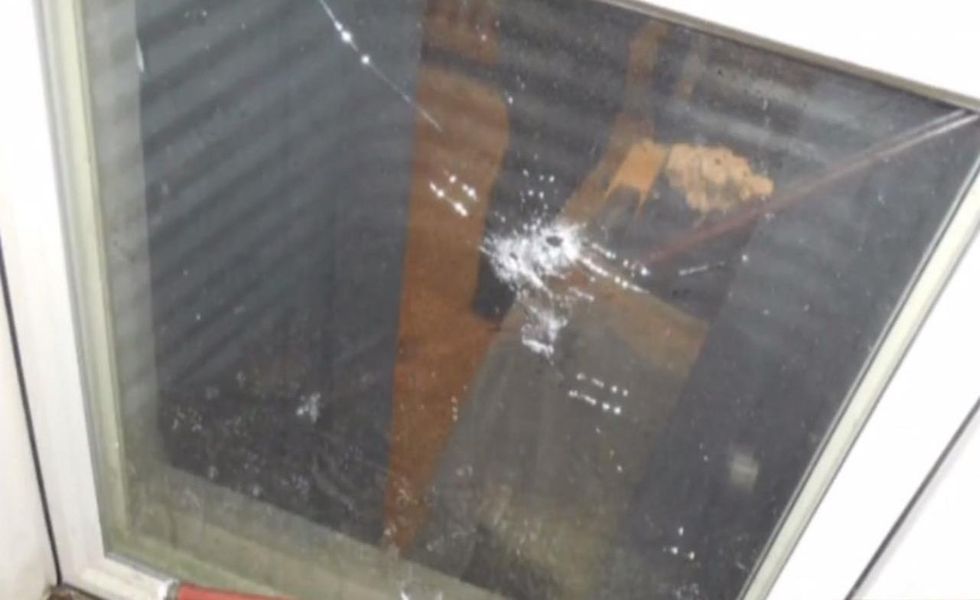 Armed father sees intruder crouching outside his children's bedroom ...