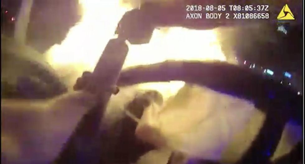 Watch Incredible Bodycam Footage Captures The Moment Hero Cop Rescues